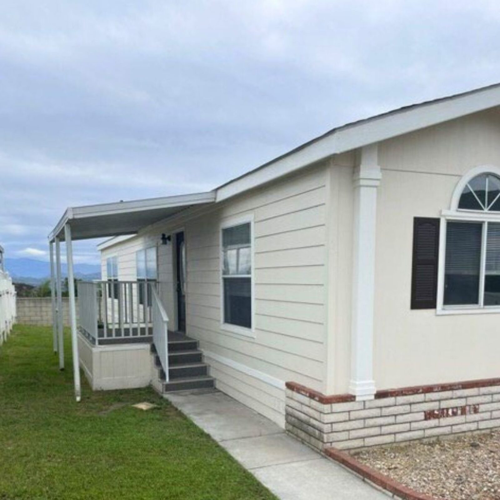 Pedley Home 104 Stairs and Entrance | Santiago Communities, Inc.